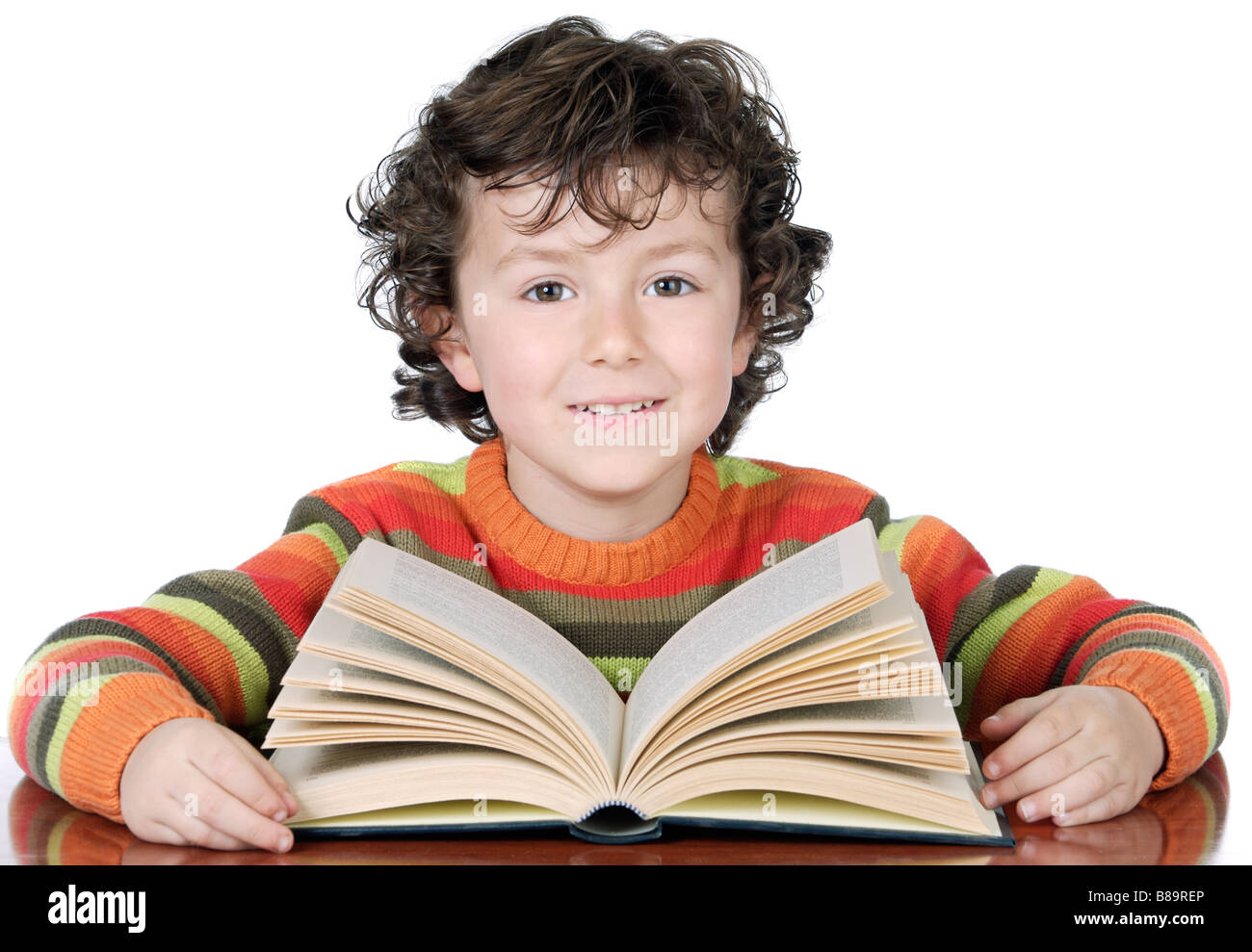 adorable boy studying a over white background Stock Photo - Alamy