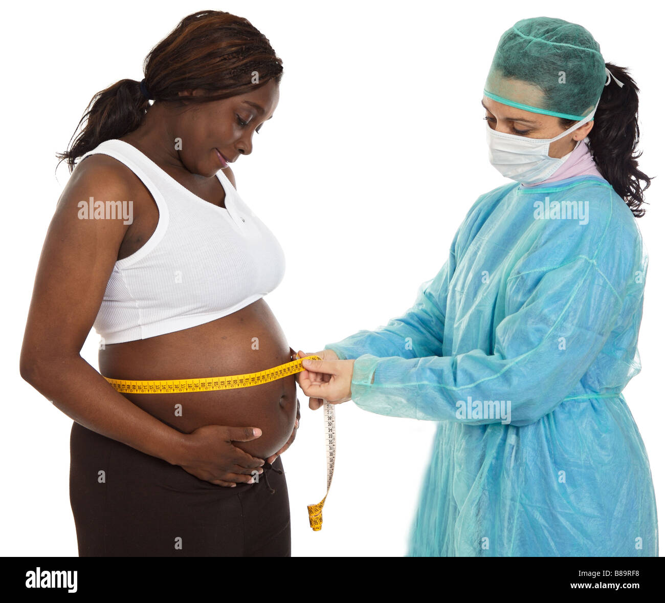 Doctor Examining Stomach Girl Stock Photos & Doctor Examining Stomach ...
