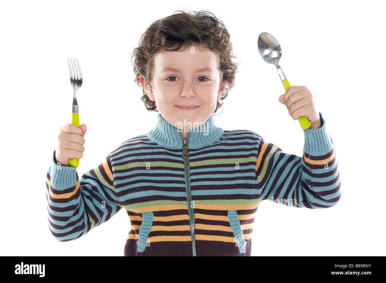 Child with a spoon and fork a over white background Stock Photo - Alamy