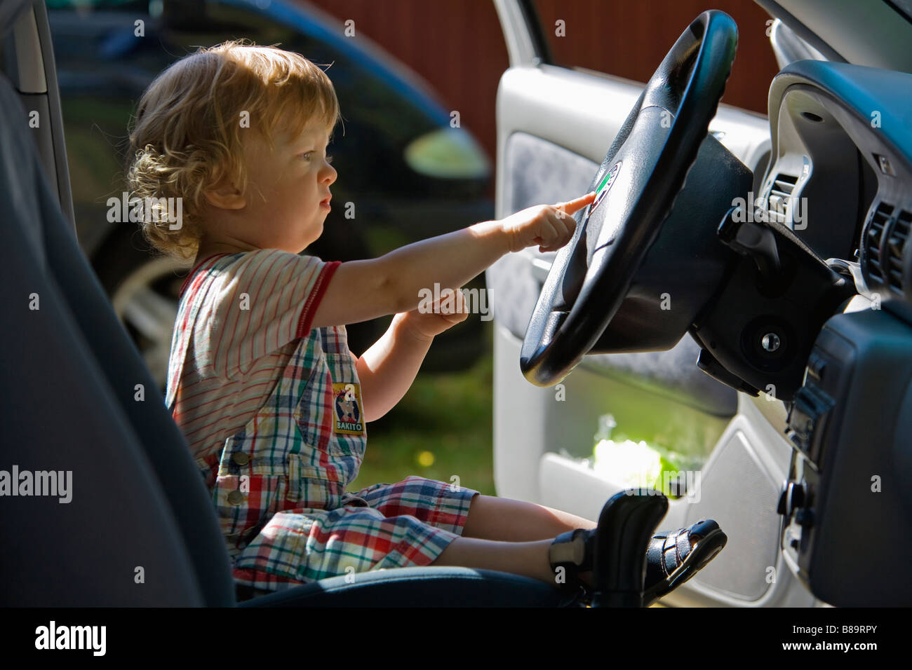 Children pretending drive hi-res stock photography and images - Alamy