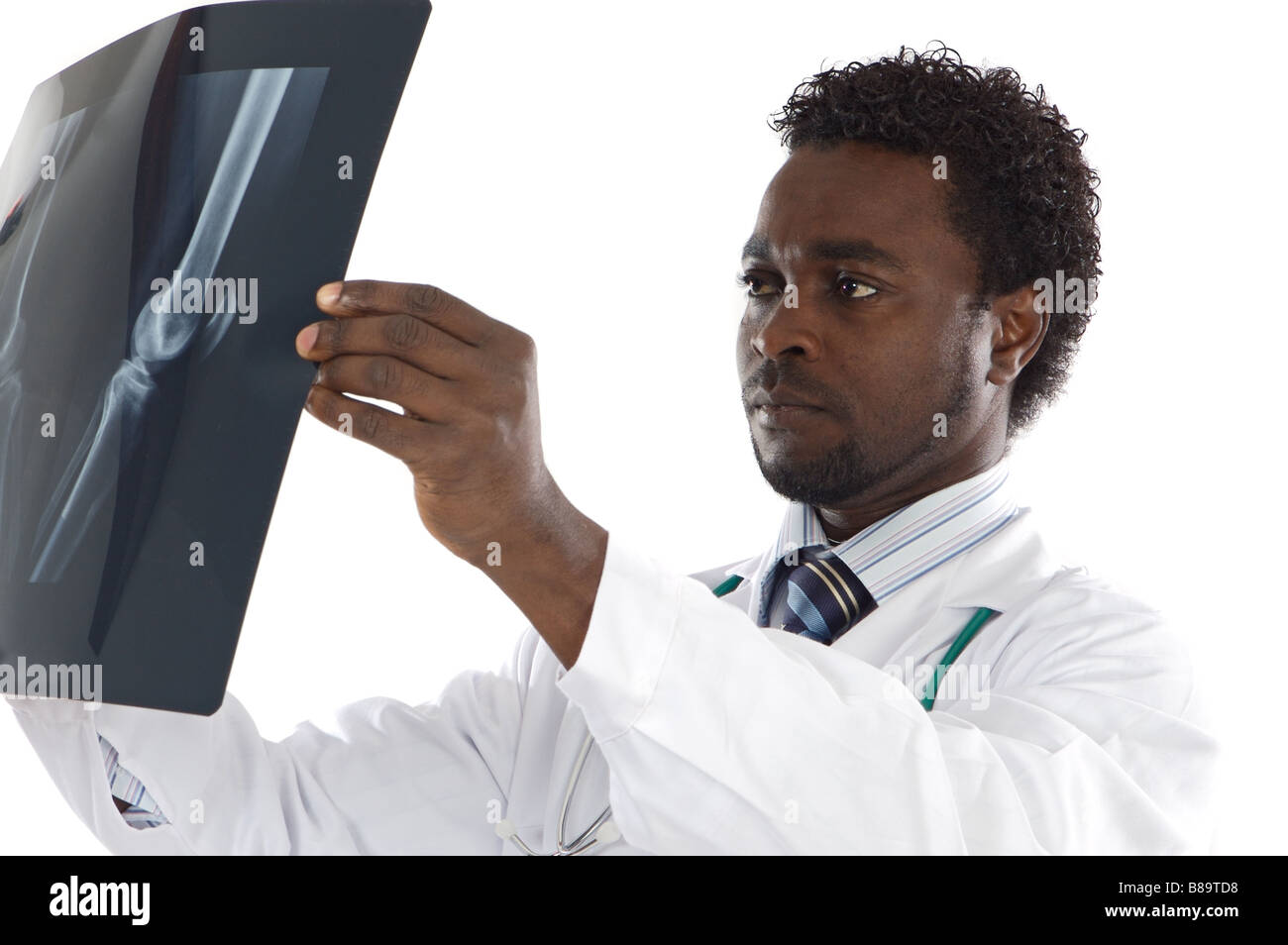 Doctor whit radiography a over white background Stock Photo - Alamy