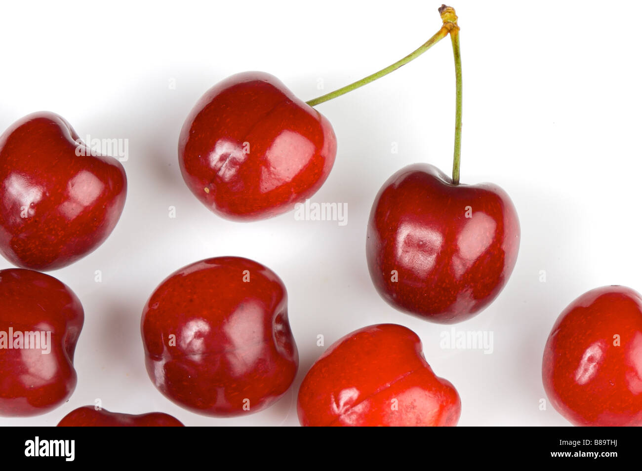 Photo of red cherriess over white background Stock Photo - Alamy
