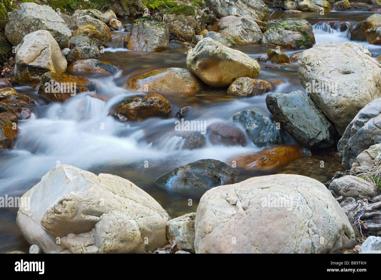 Water movement in the waterfall on stone background Stock Photo - Alamy