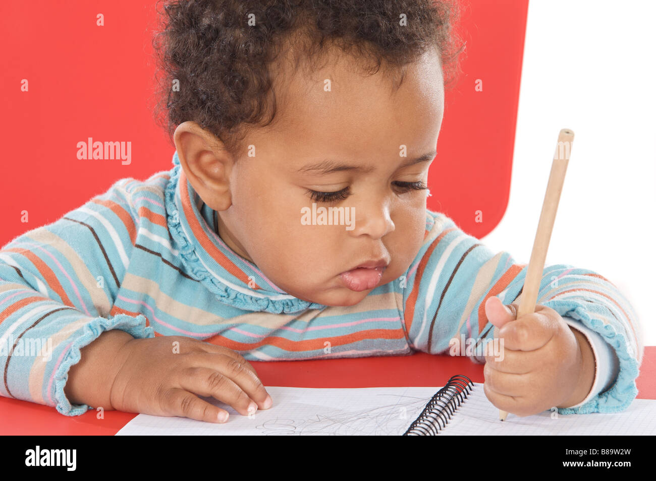 adorable baby student a over white background Stock Photo - Alamy