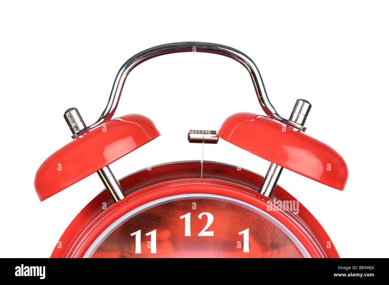 Classic red clock a over white background Stock Photo - Alamy