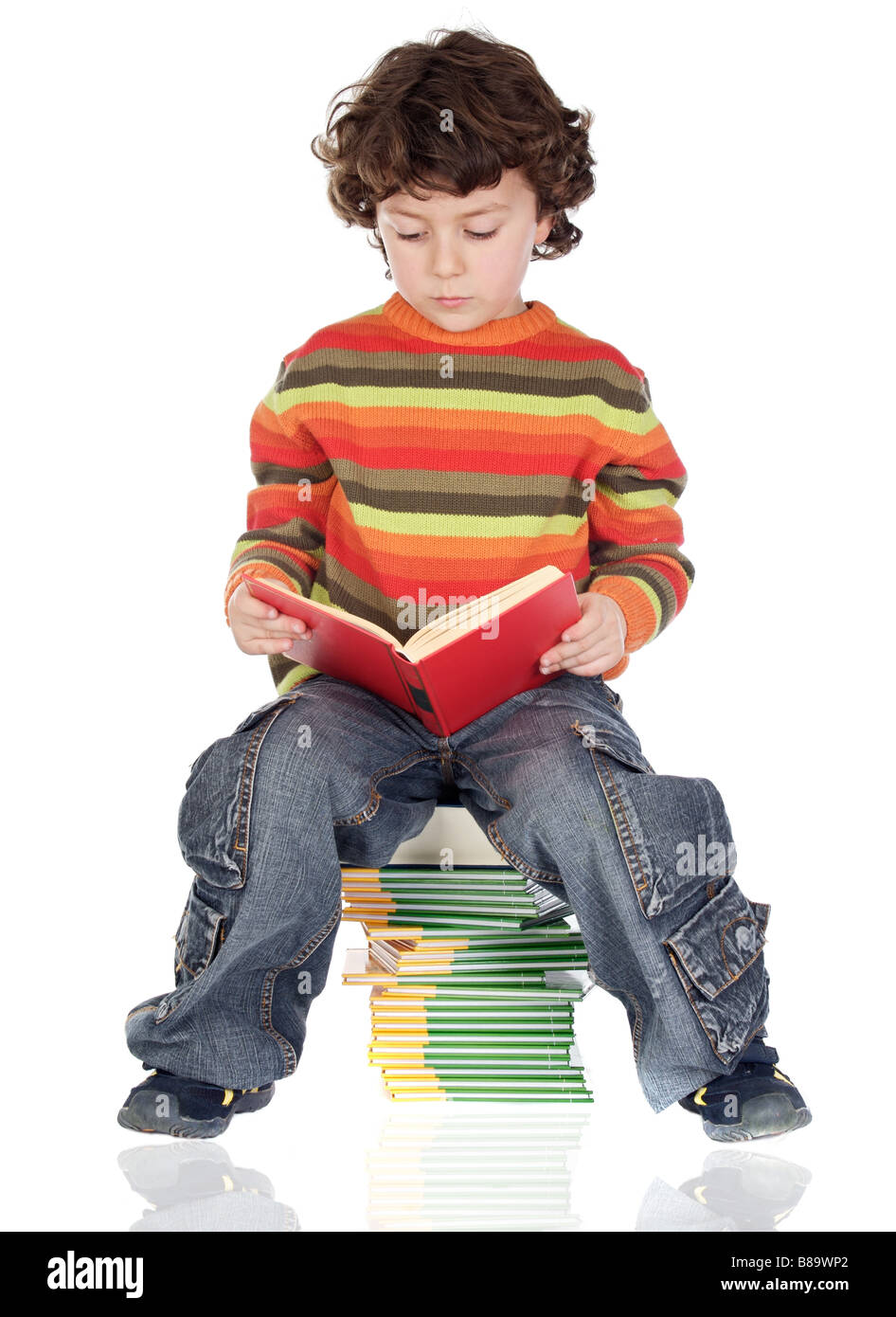 adorable child studying a over white background Stock Photo - Alamy