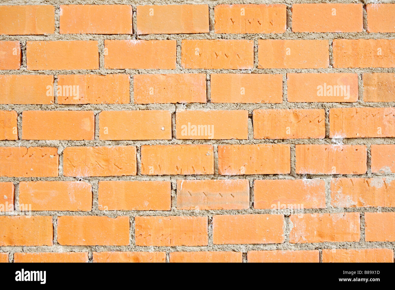 photo of a plain red Brick wall for background Stock Photo - Alamy