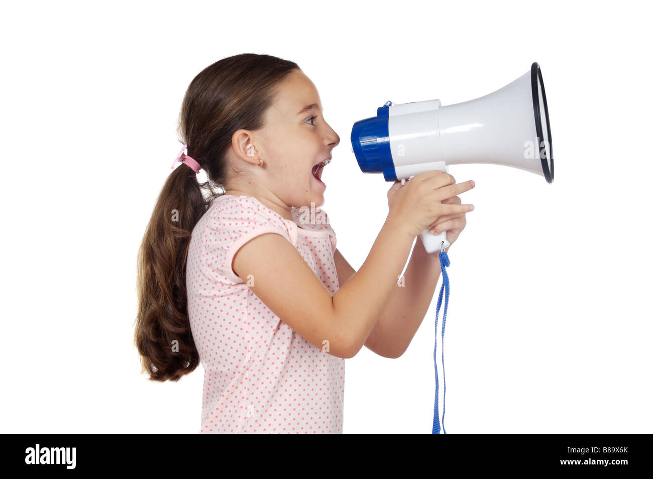 Little girl shouting through megaphone over white background Stock ...