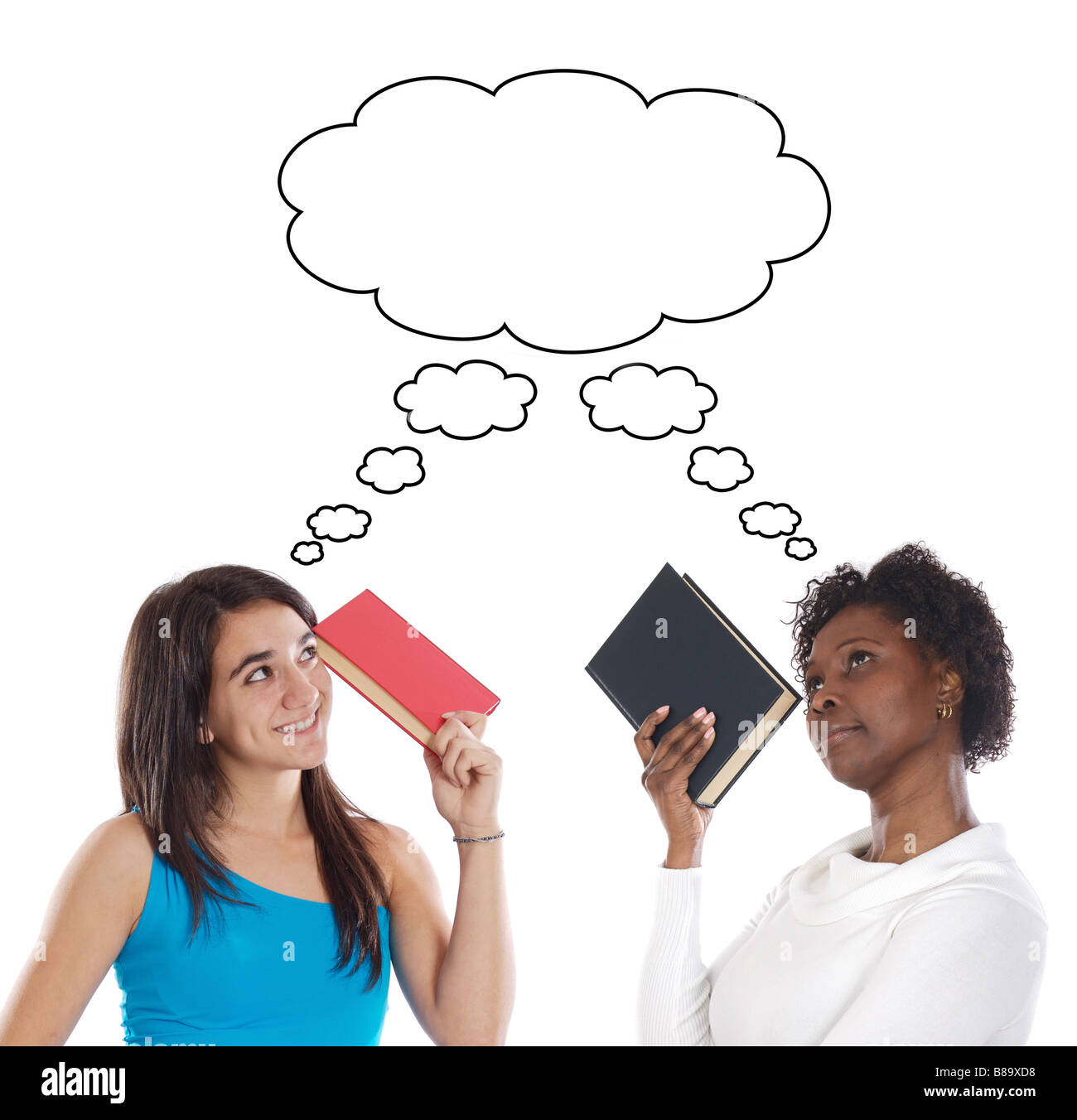 Couple of young girls thinking with books Stock Photo - Alamy