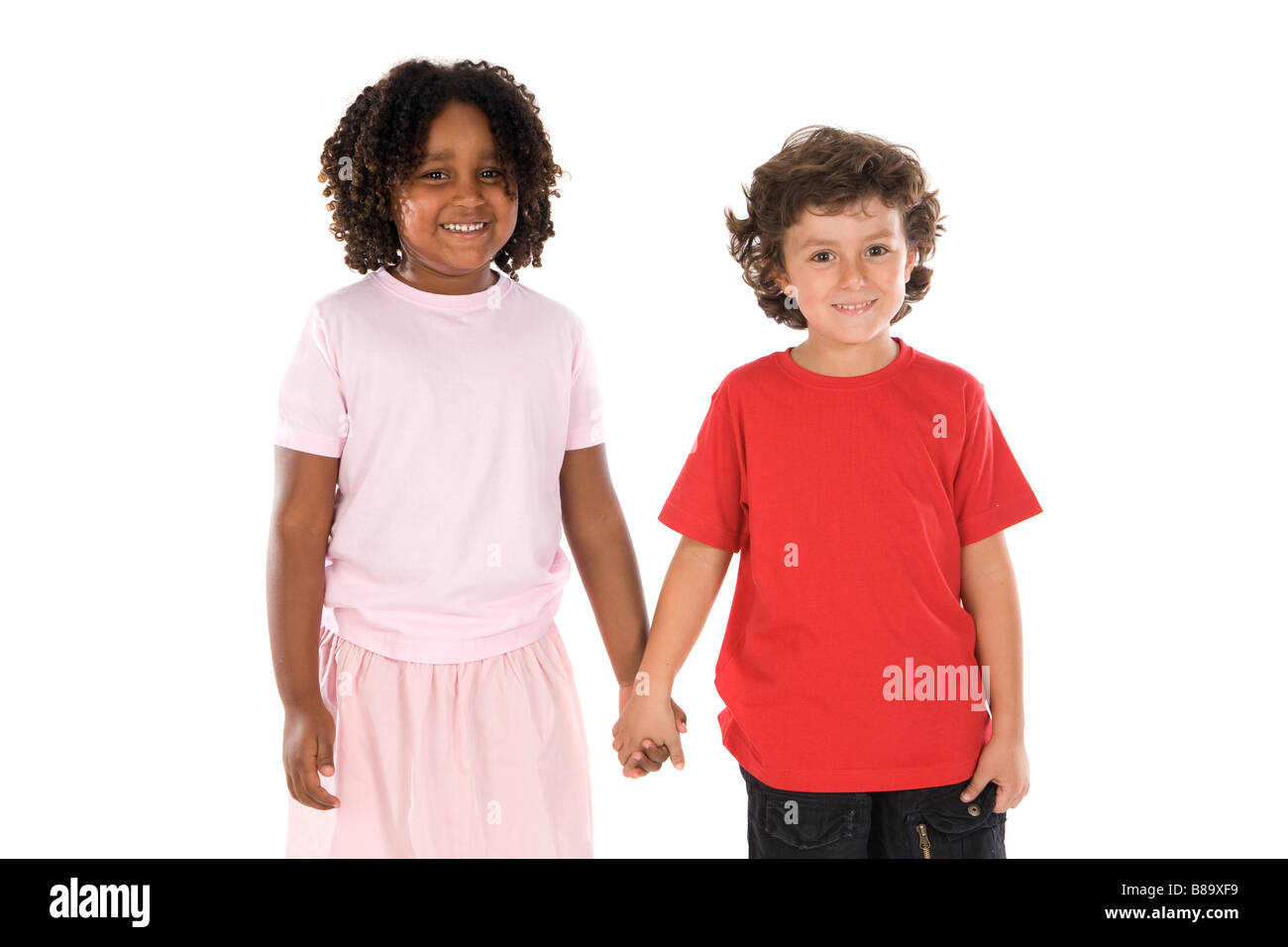 two handsome children of different races with their hands together ...