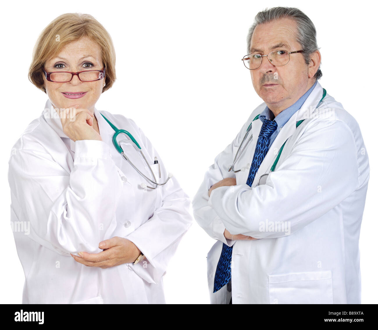 Couple of seniors doctors a over white background Stock Photo - Alamy