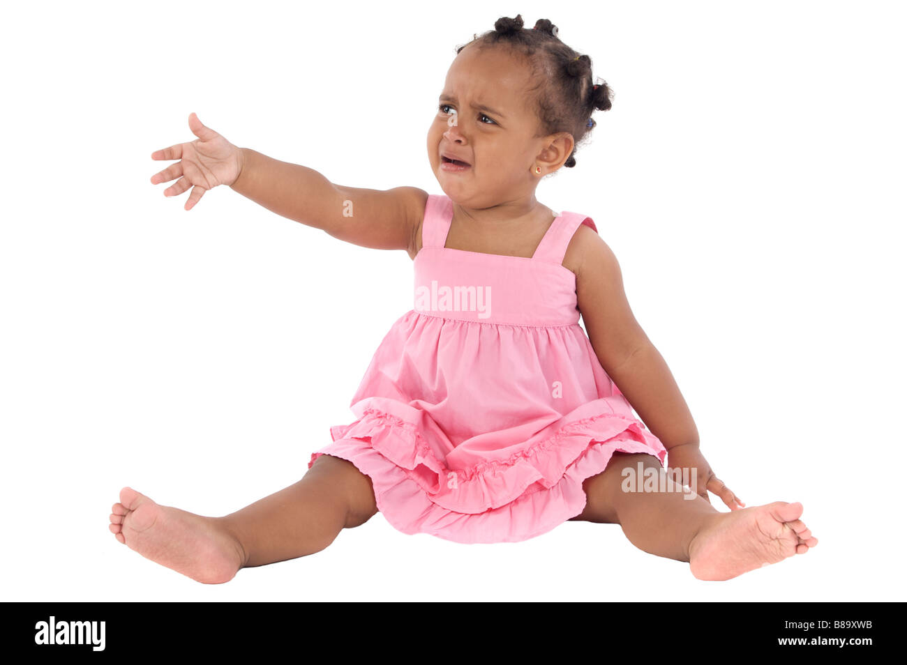 Adorable baby crying a over white background Stock Photo - Alamy