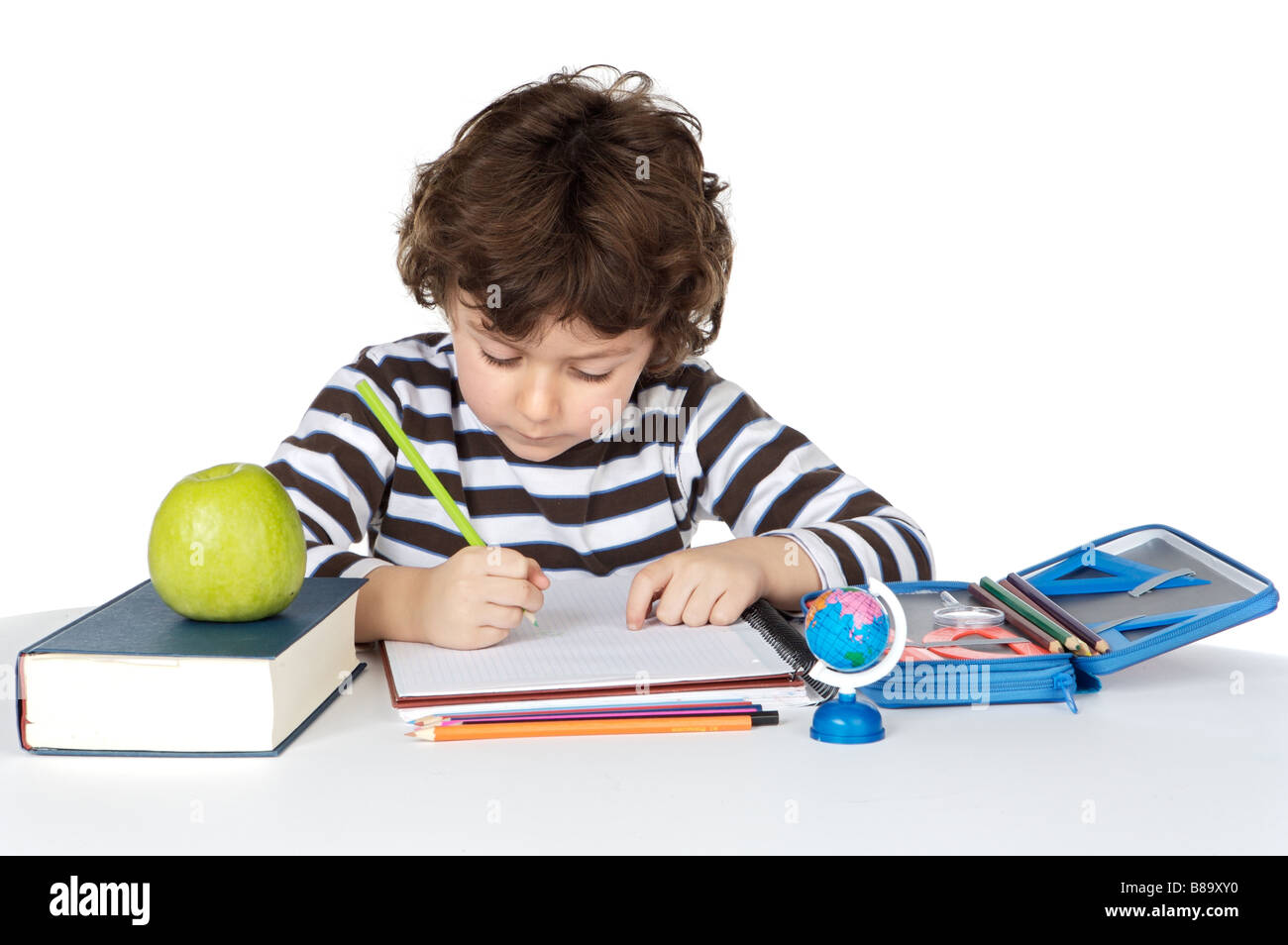 adorable child studying a over white background Stock Photo - Alamy