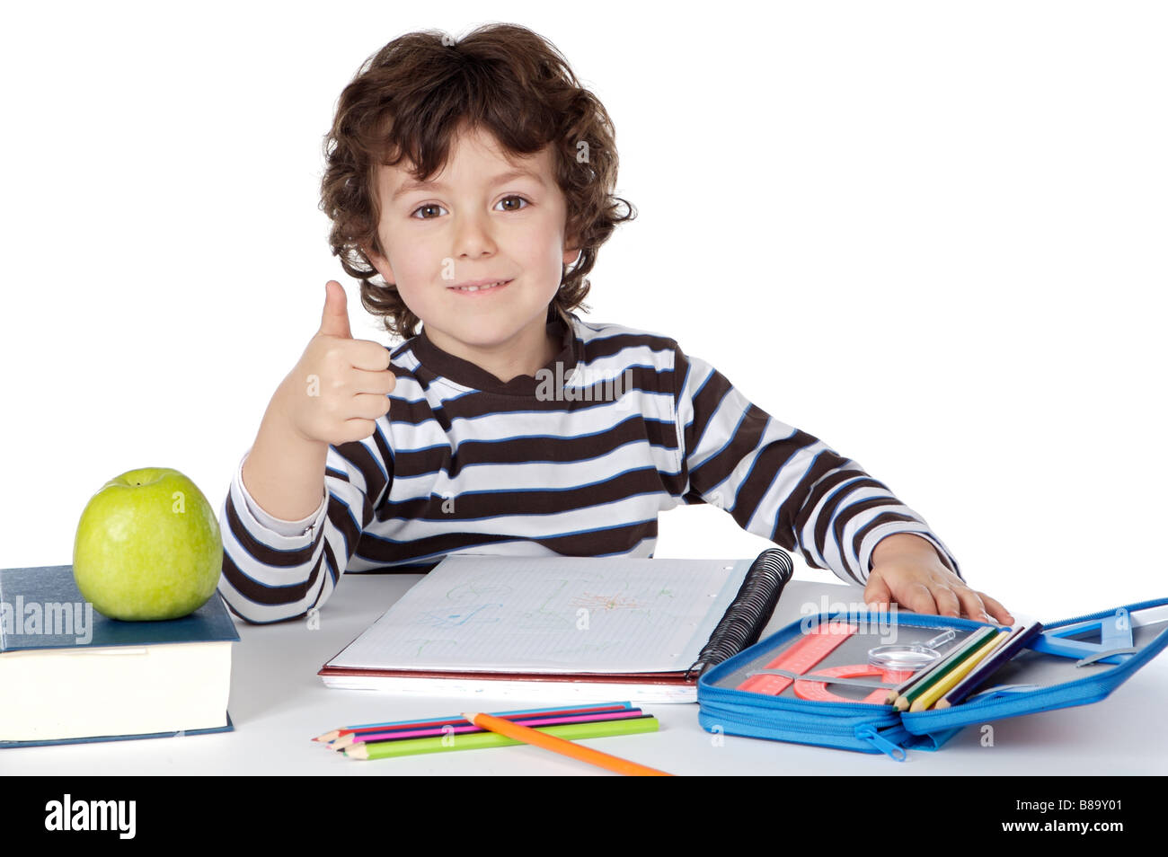 adorable boy studying a over white background Stock Photo - Alamy