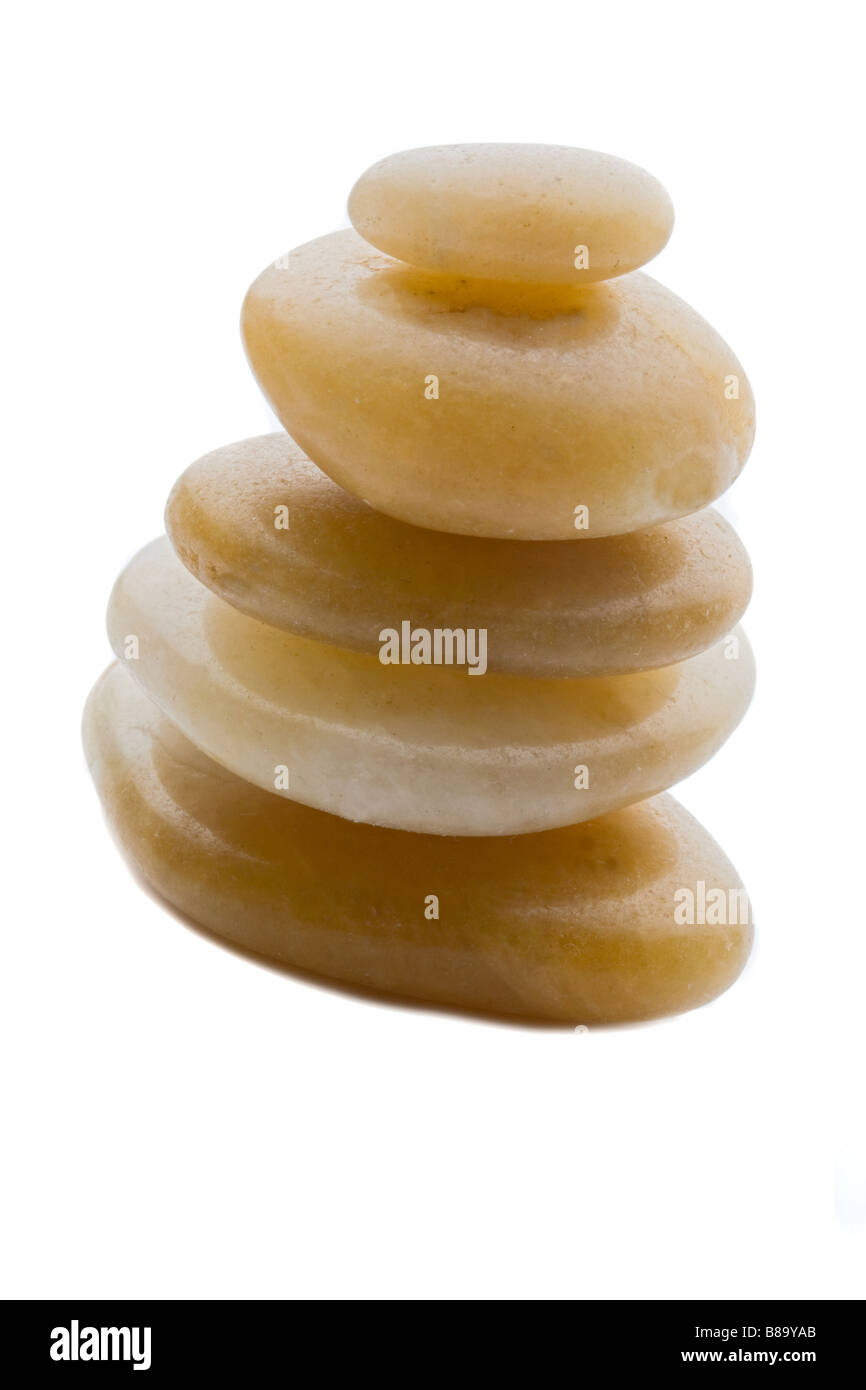 Rocks in balance a on over white background Stock Photo - Alamy