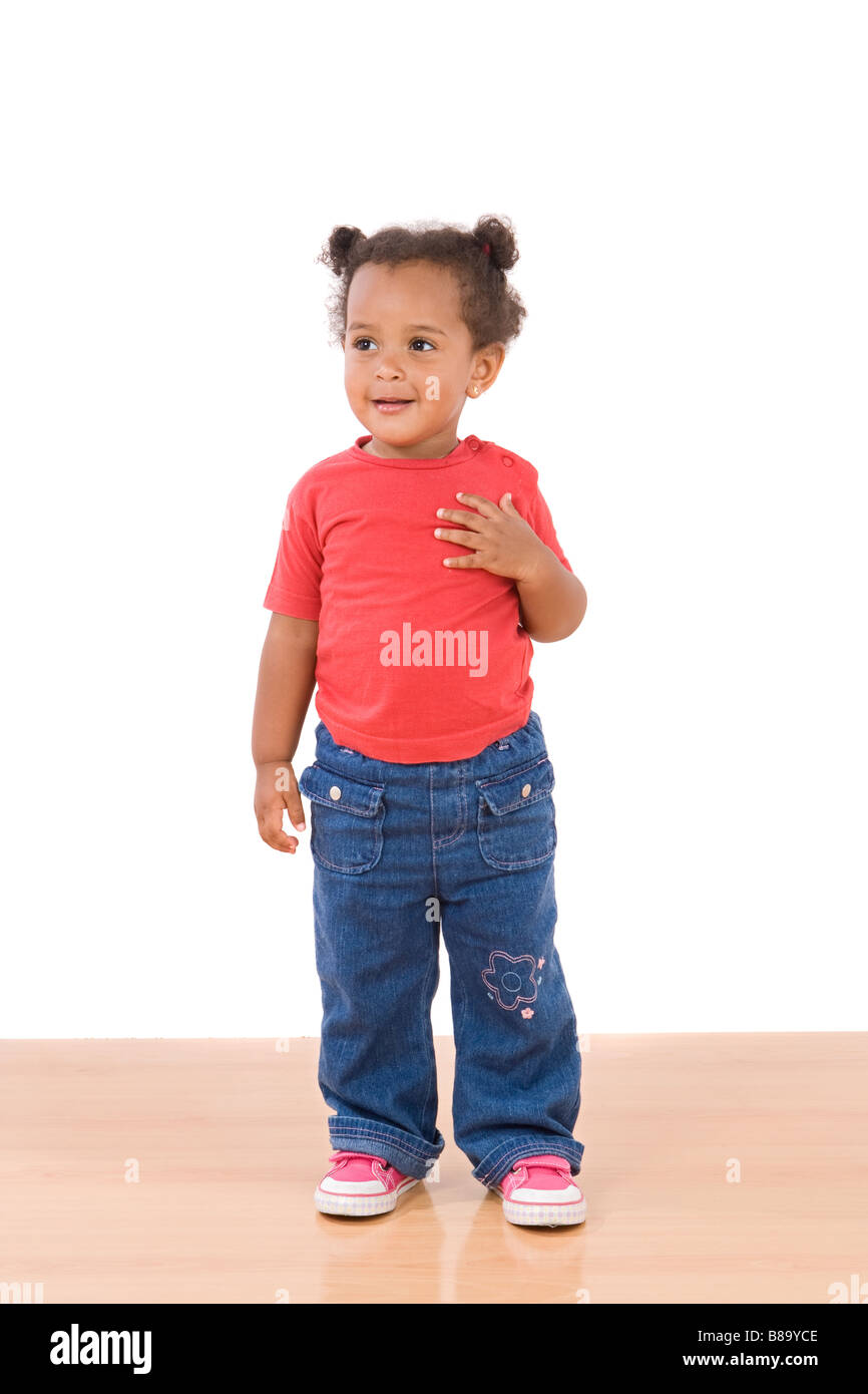 Adorable african baby standing over wooden floor Stock Photo - Alamy