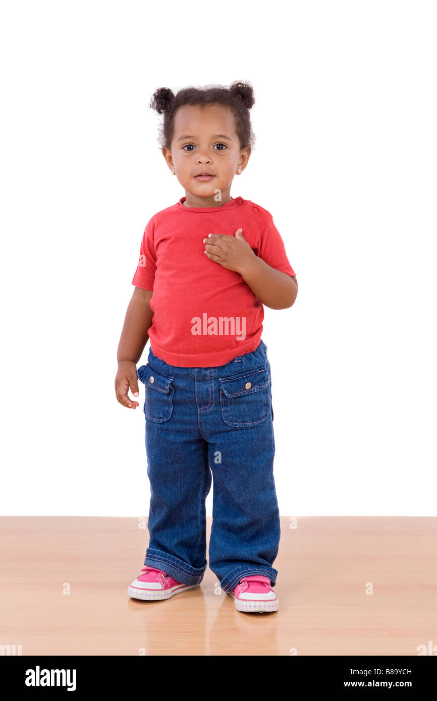 Adorable african baby stand over wooden floor Stock Photo - Alamy