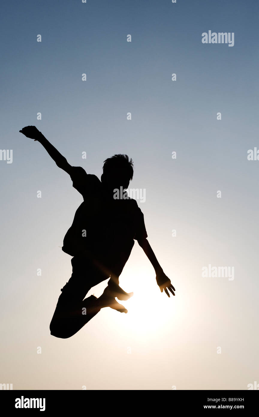 Jumping boy silhouette hi-res stock photography and images - Alamy