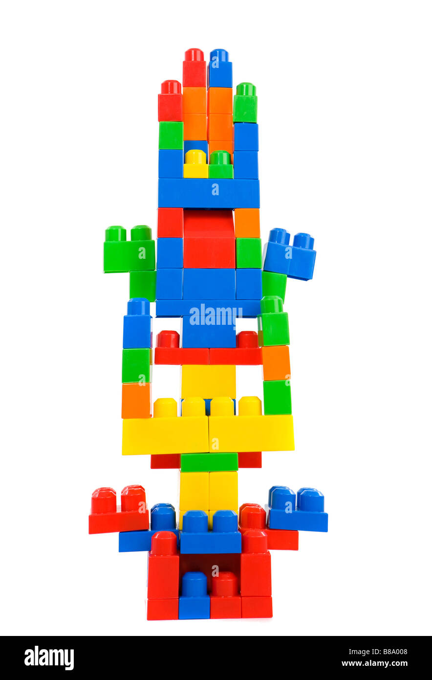 Many colored pieces forming one tower isolated on white Stock Photo - Alamy