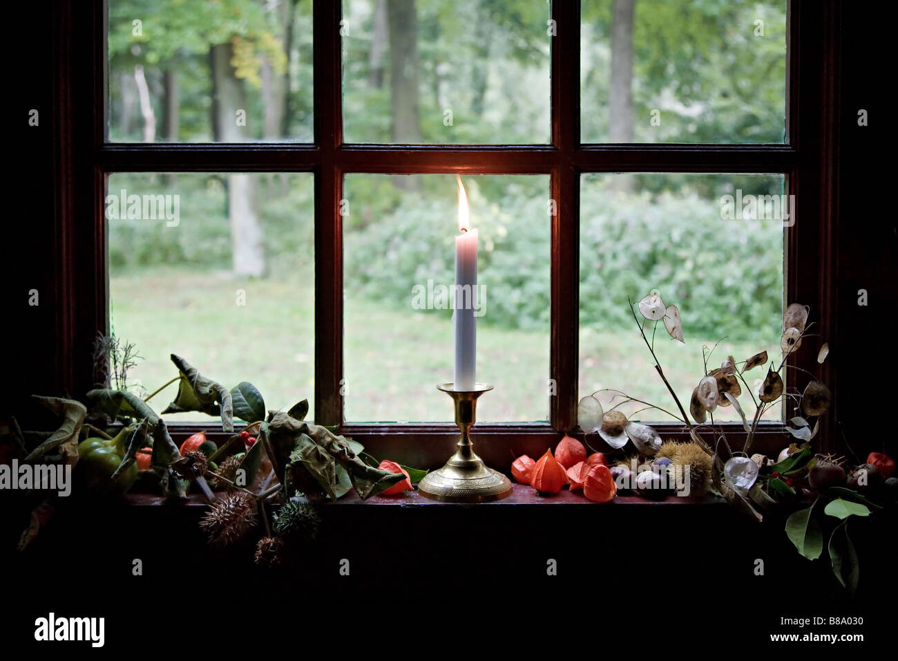 A solitary candle in the window of an old Dutch farmhouse in Arnhem ...