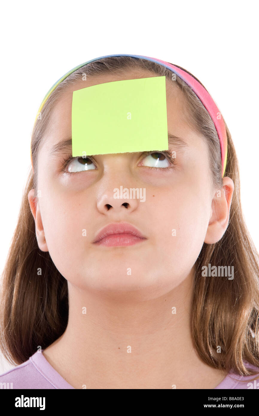 Adorable girl with a paper in her front isolated over white Stock Photo ...