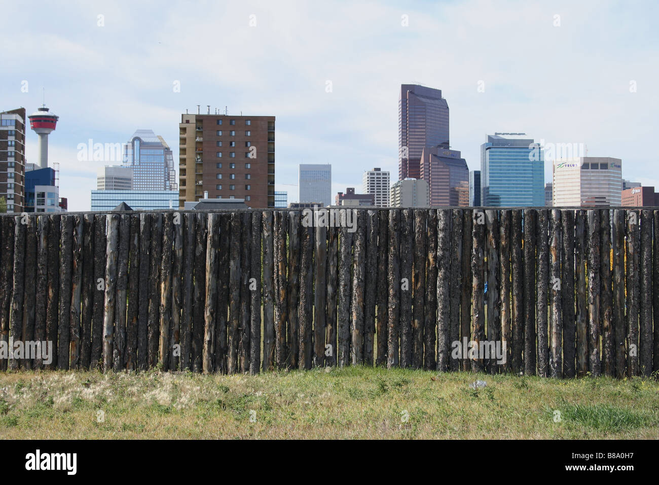 wooden wall at Fort Calgary and Calgary skyline Alberta Canada ...