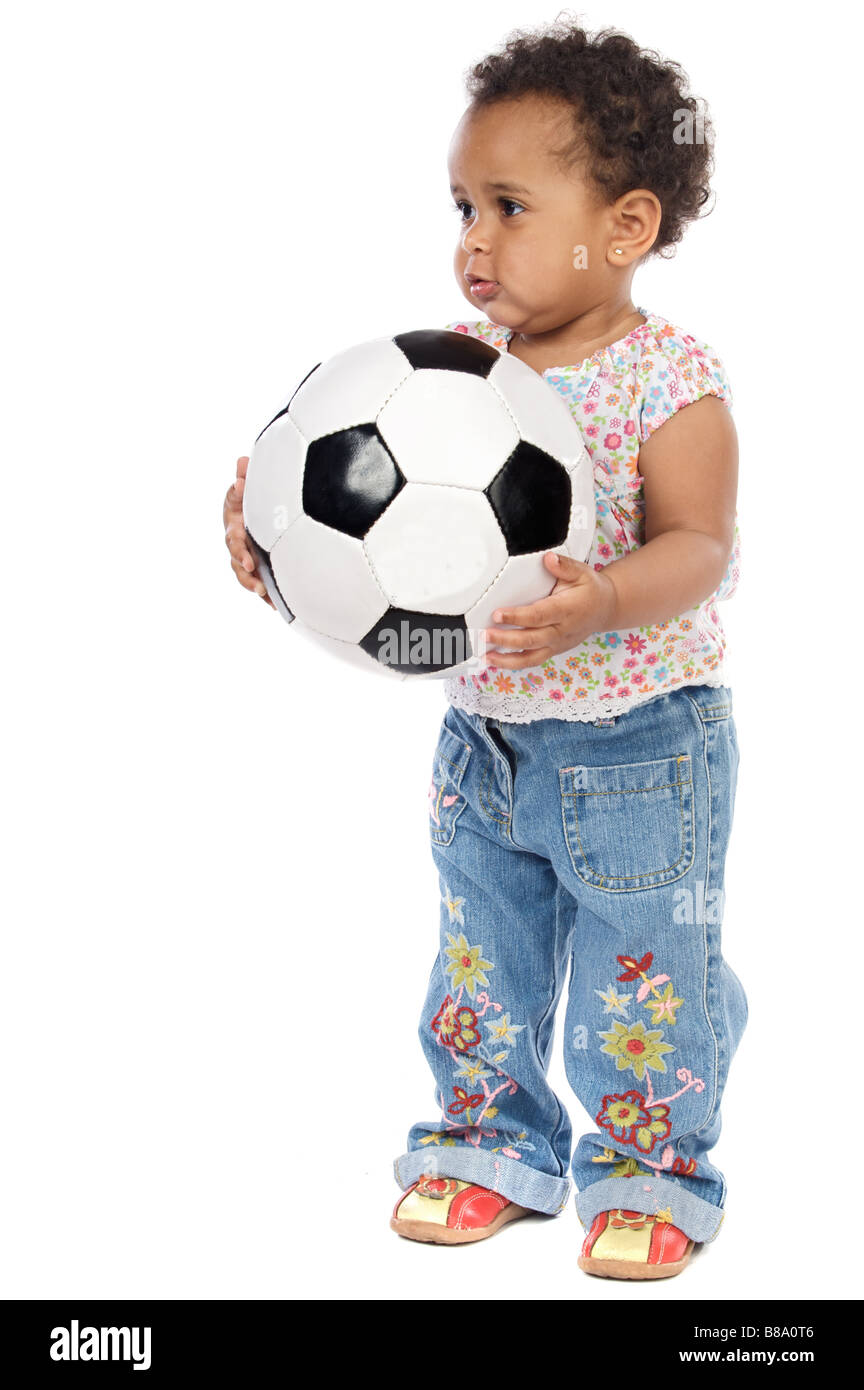 Baby with soccer ball a over white background Stock Photo - Alamy
