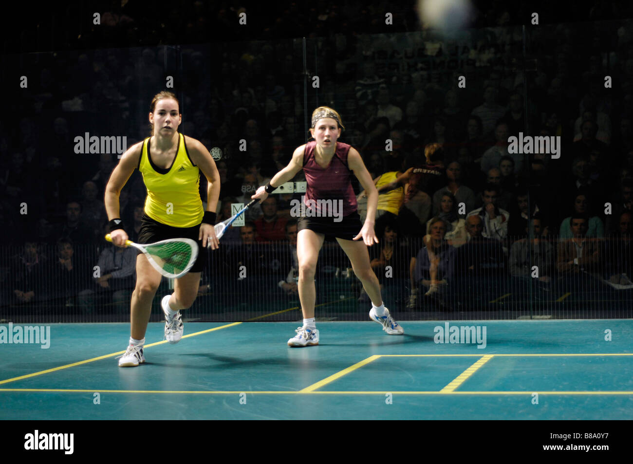 jenny duncalf plays a backhand shot in the squash national championship ...
