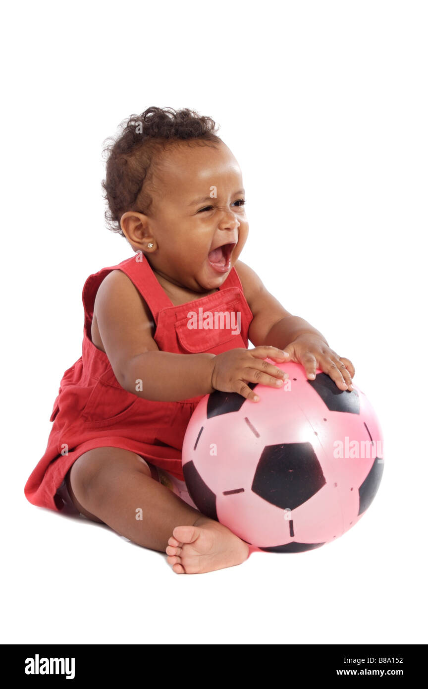 Happy baby with soccer ball a over white background Stock Photo - Alamy
