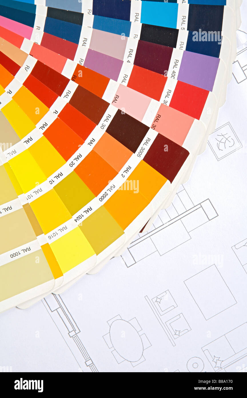 By choosing the colors of the new house on plans Stock Photo - Alamy