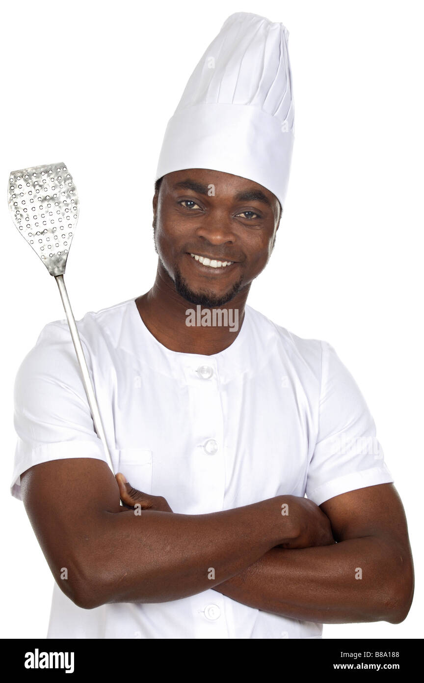 African handsome cook with kitchen utensils in your hand Stock Photo ...