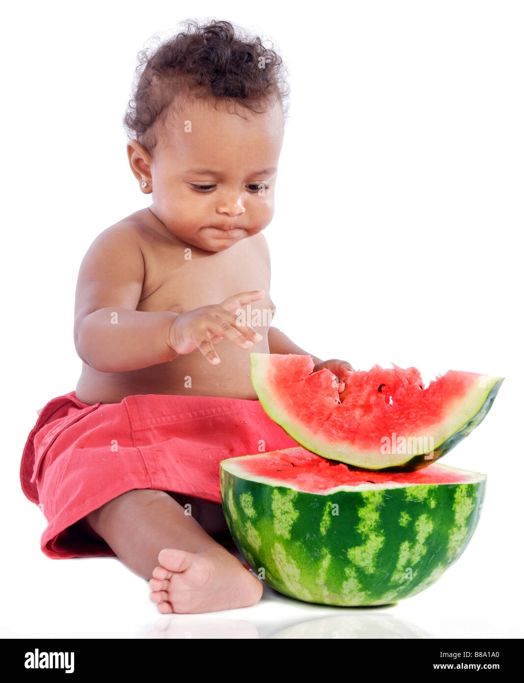 adorable baby eating watermelon a over white background Stock Photo - Alamy
