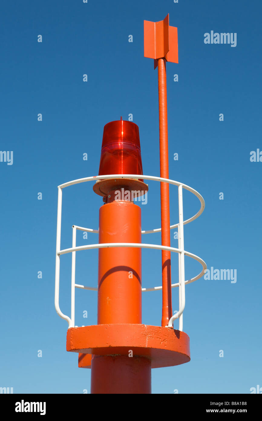 photo of small lighthouse on the daytime sky blue Stock Photo - Alamy