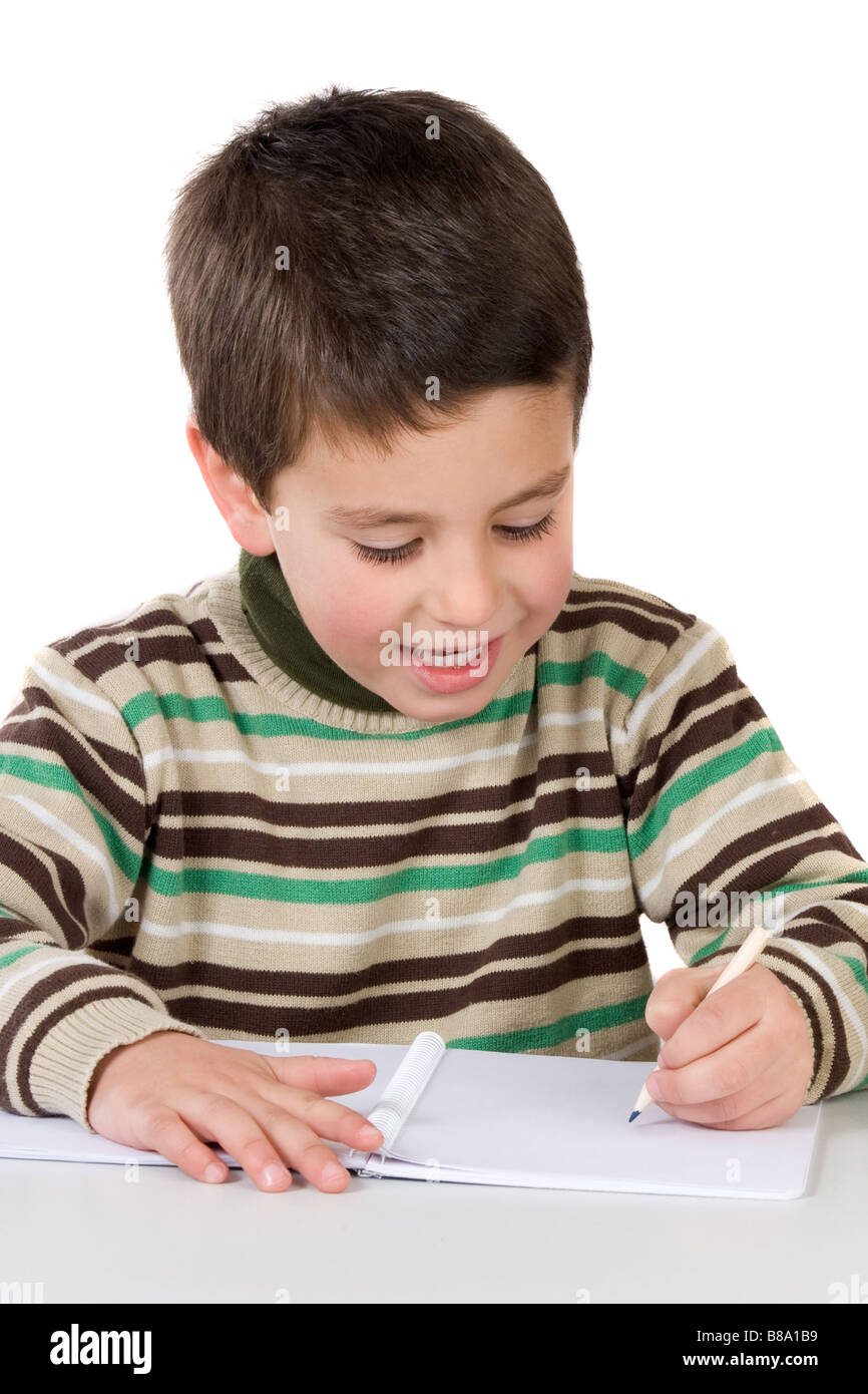 Adorable child writing in the school on a over white background Stock ...