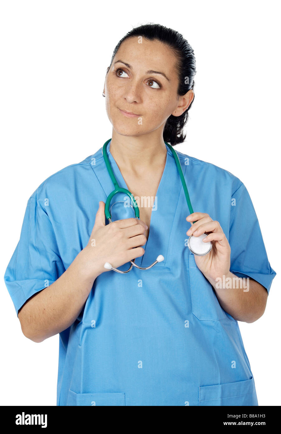 Attractive lady doctor thinking over a white background Stock Photo - Alamy