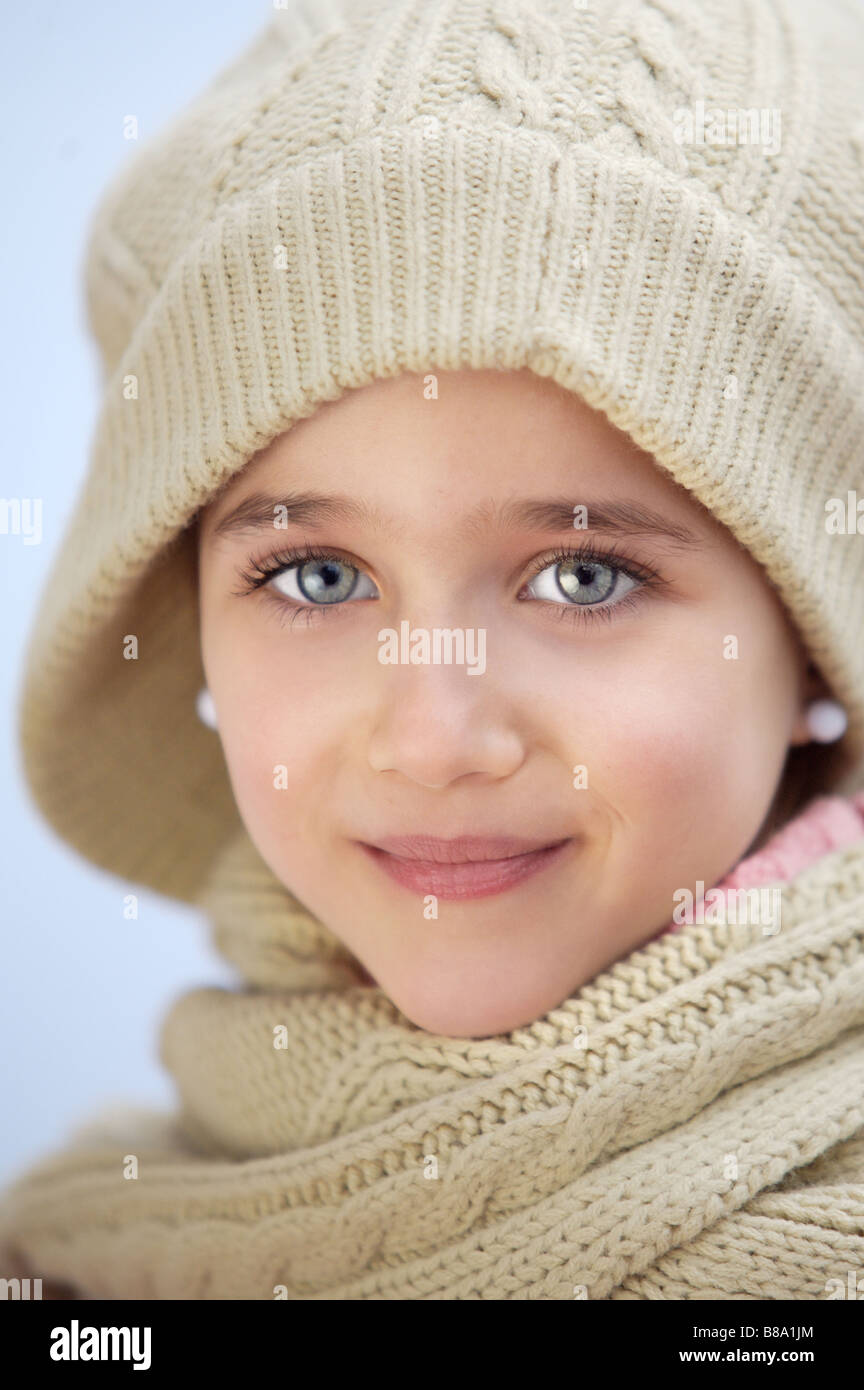 precious face of an adorable girl a over blue background Stock Photo ...