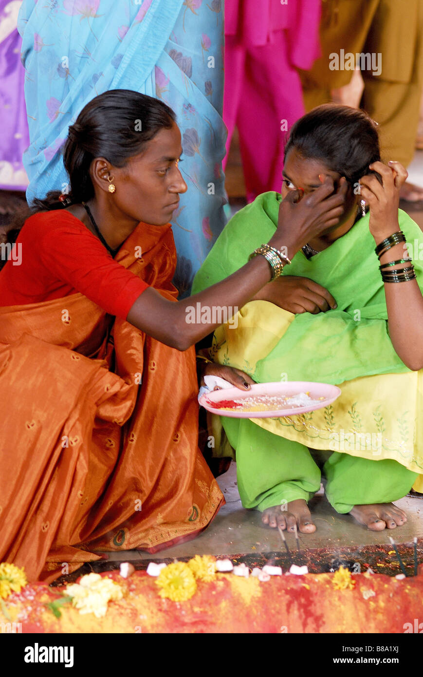 Two Indian women devotees in saree at Ambajogai temple Parbhani ...