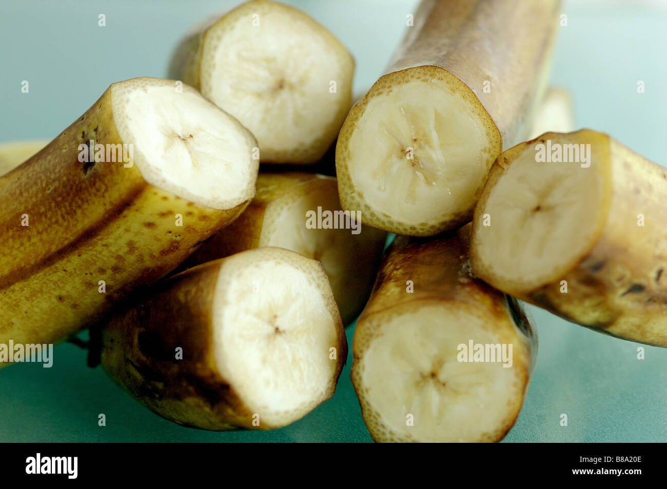 Seven banana fruit cut pieces Stock Photo - Alamy