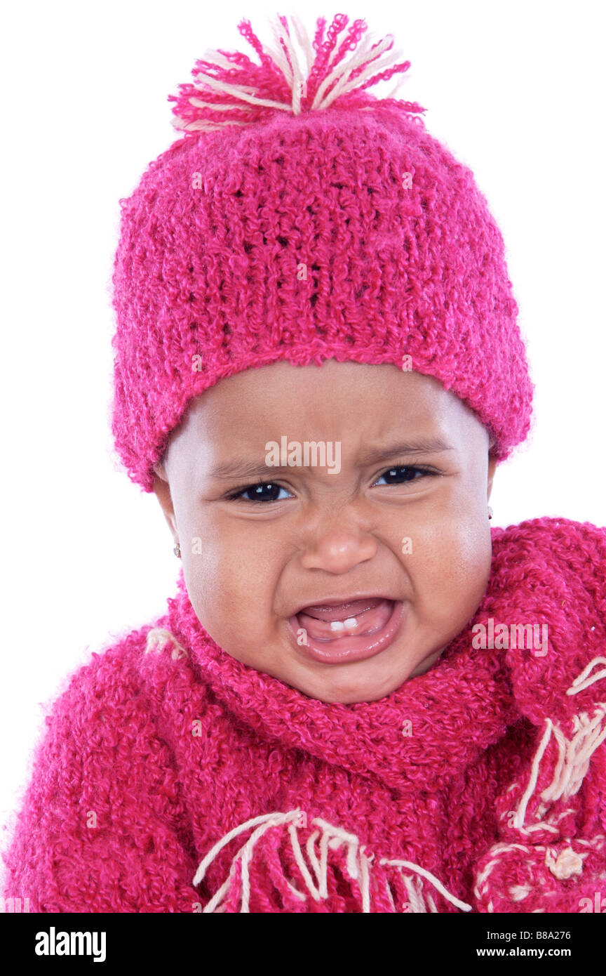 Adorable baby crying a over white background Stock Photo - Alamy