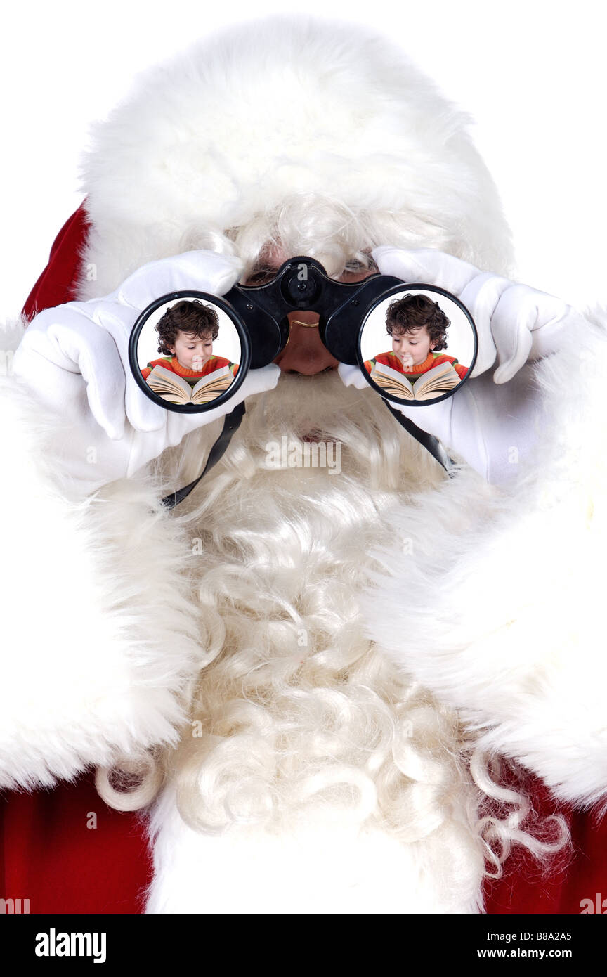 santa claus with binoculars watching children study a over white ...