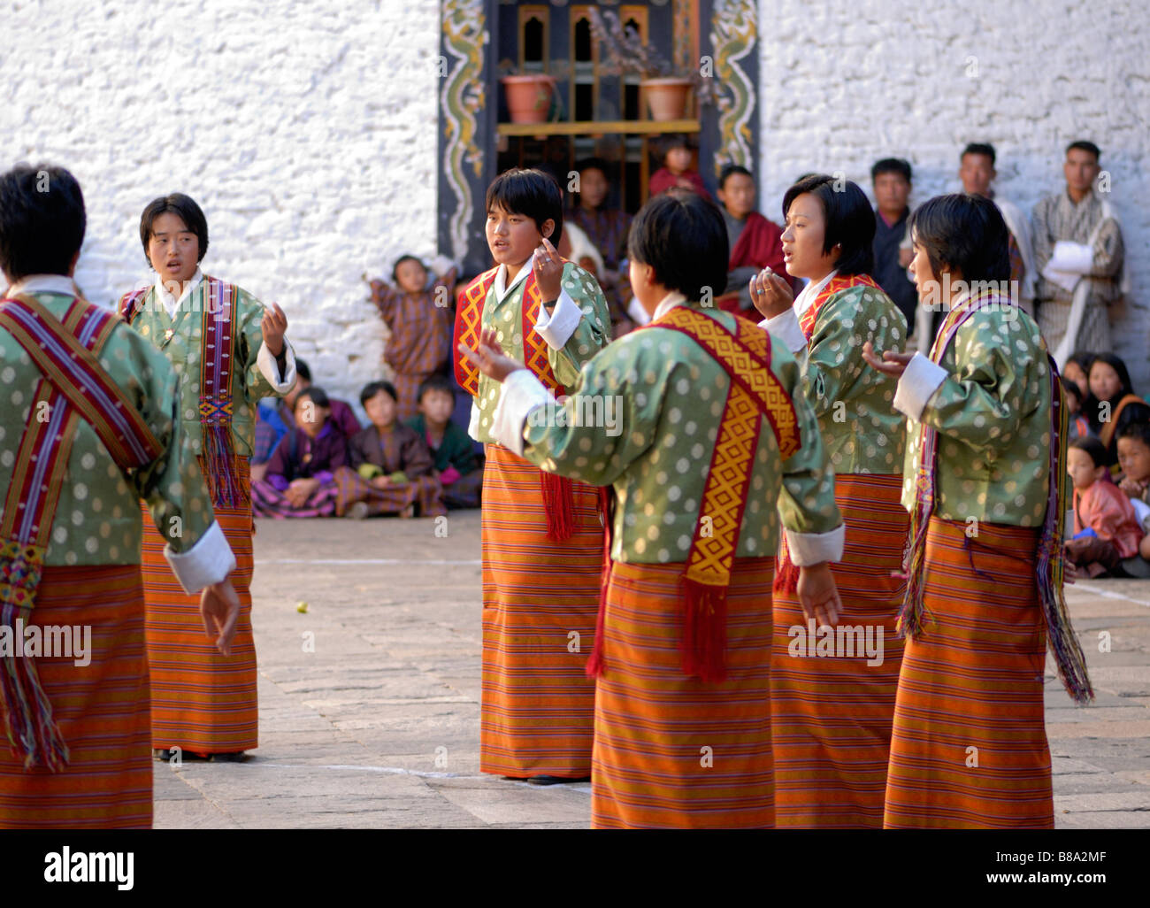 A choir of elegant young ladies at the Trashigang festival, Trashigang ...