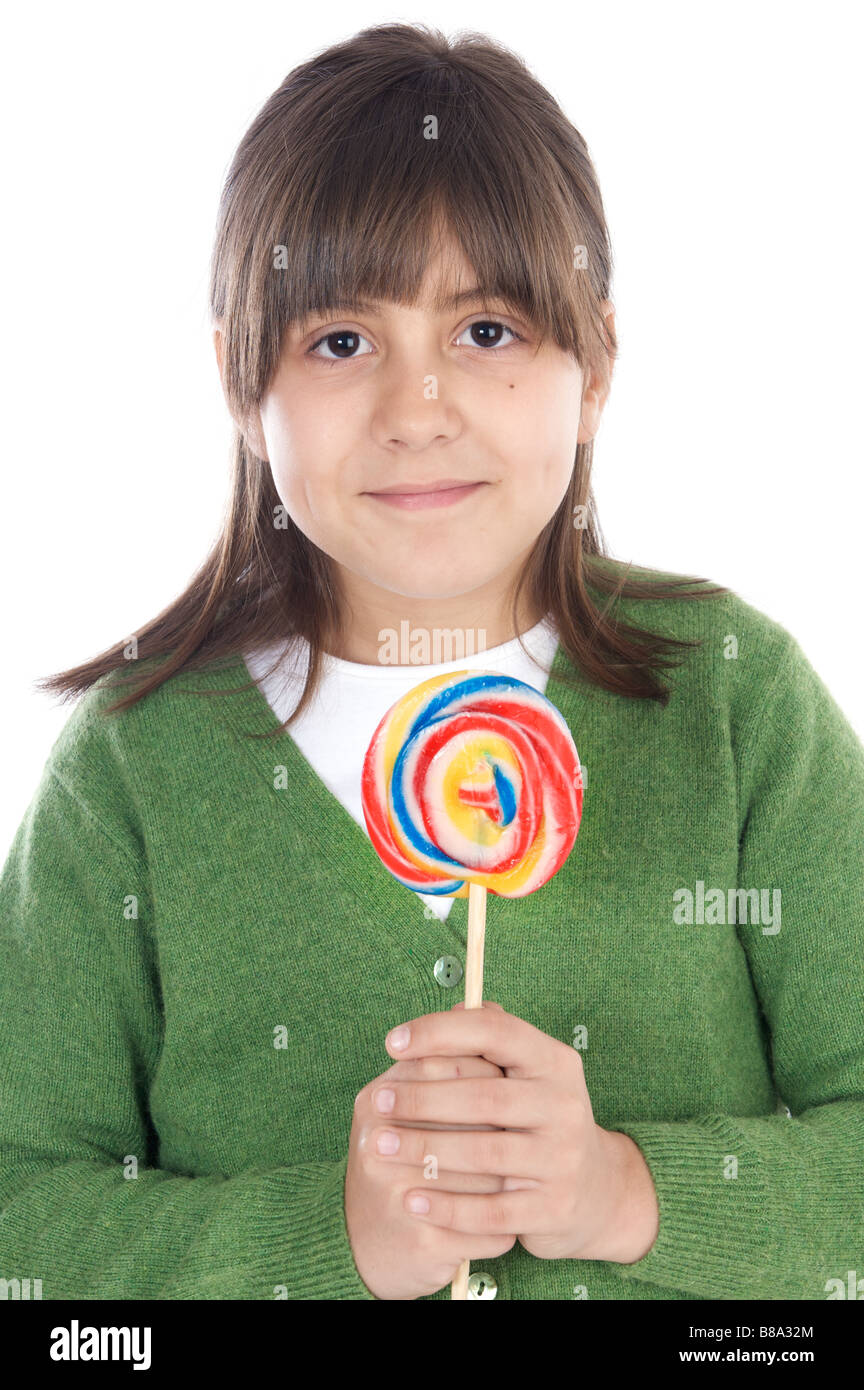 Cute young girl with one lollipop over white background Stock Photo - Alamy