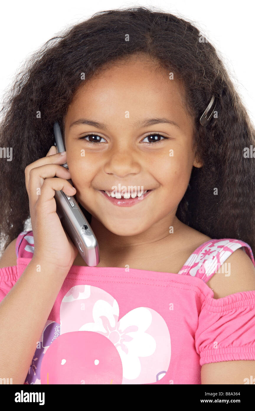 adorable girl speaking on the telephone a over white background Stock ...