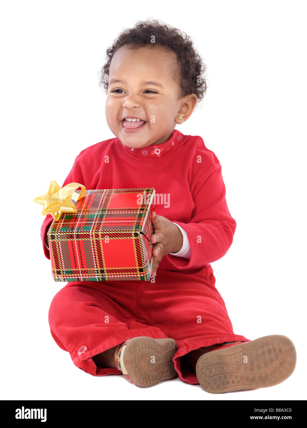 Baby with a gift box a ver white background Stock Photo - Alamy
