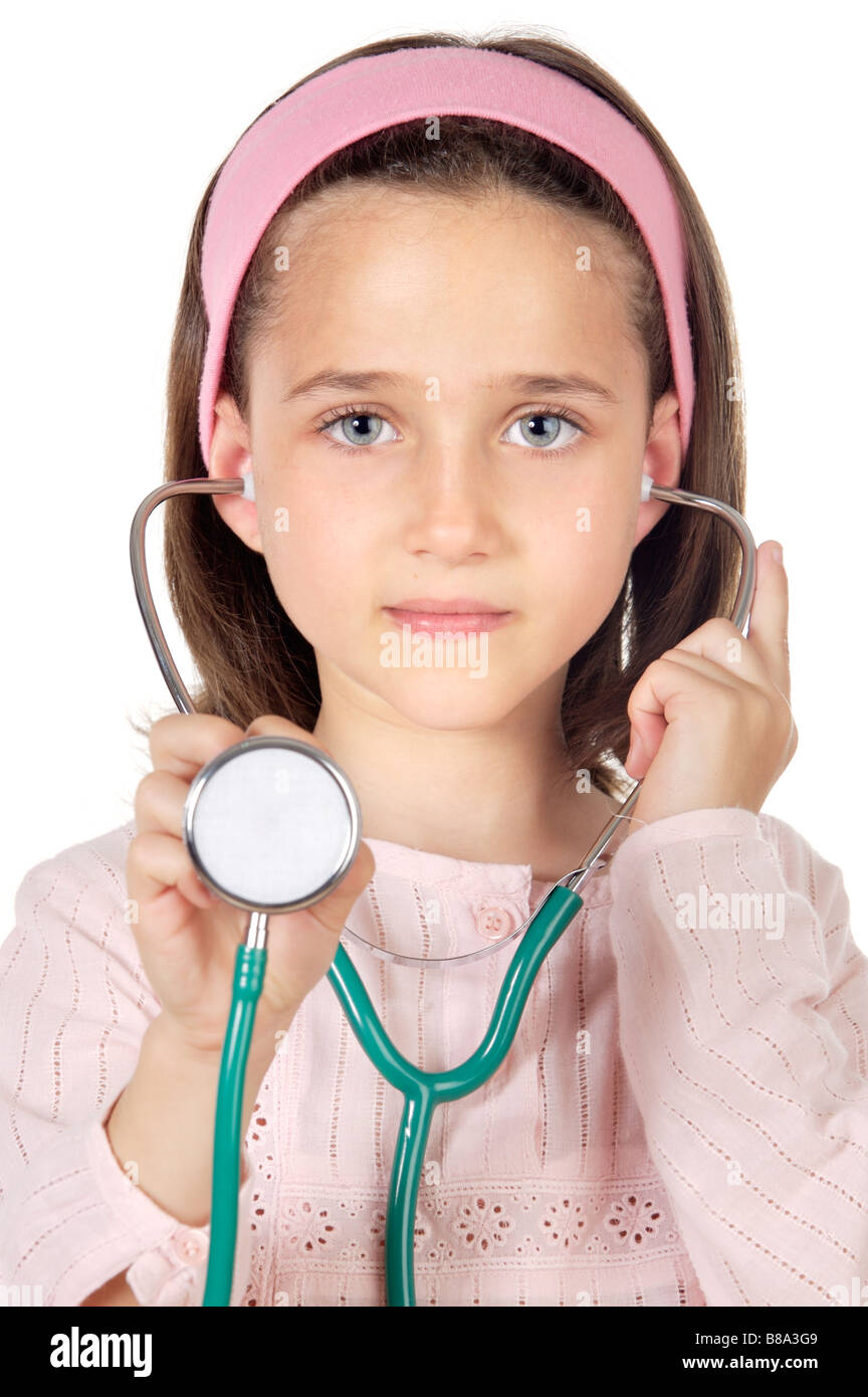 Little doctor examining a over white background Stock Photo - Alamy