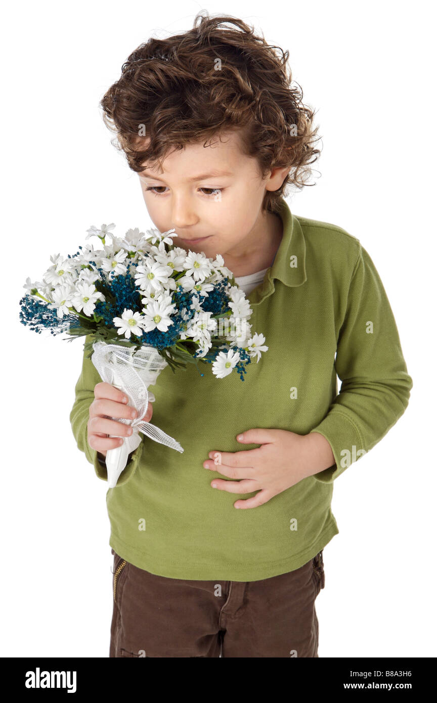 photo of an adorable boy with flowers Stock Photo - Alamy