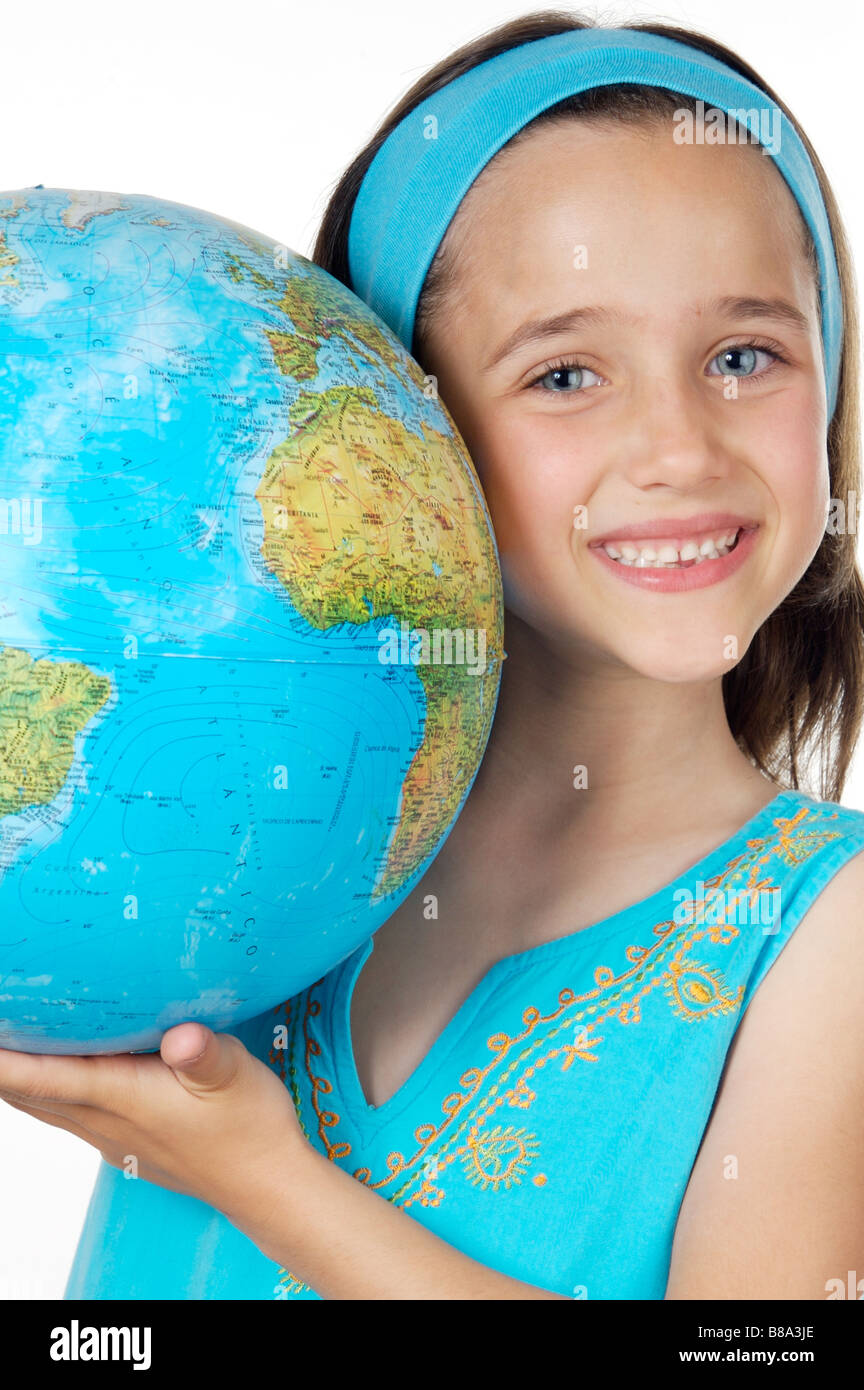 Girl with a globe of the world over white background Stock Photo - Alamy
