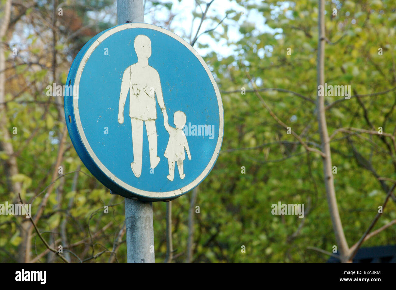 Blue and white sign indicating walk way,walking path for pedestrians ...