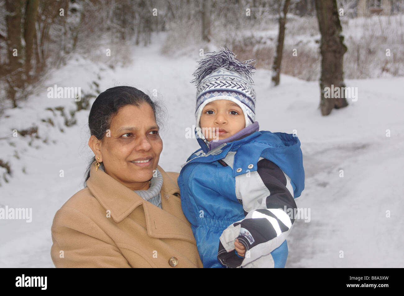 Grandchild grandmother snow hi-res stock photography and images - Alamy