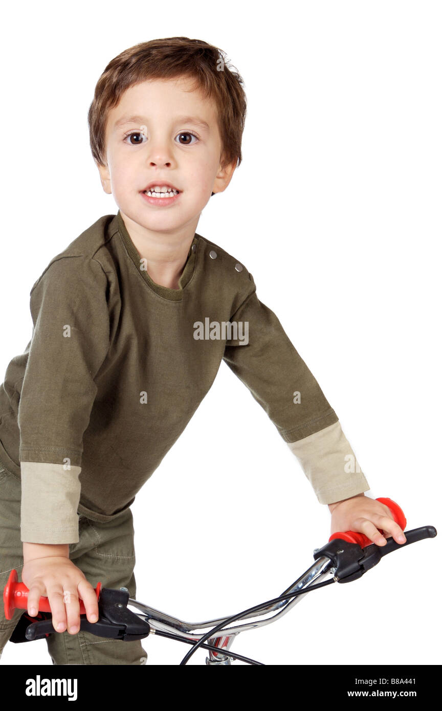 photo of an adorable boy cycling a over white background Stock Photo ...
